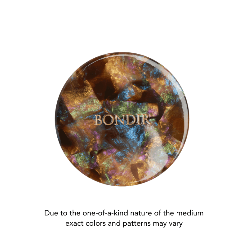 Discover BONDIR’s Amber Acetate Mirror, a chic and compact accessory ...